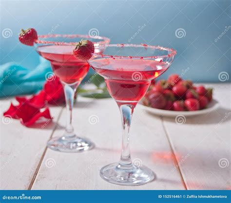Red Exotic Alcoholic Cocktail In Clear Glass And Red Roses For Romantic