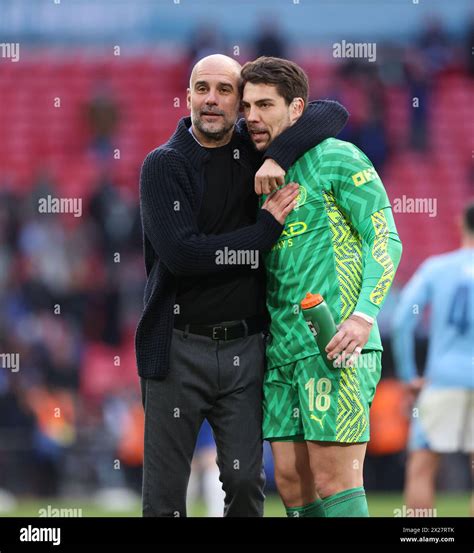 Pep Guardiola Man City Manager With Stefan Ortega Moreno Mc At The
