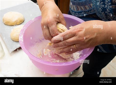 The Process Of Kneading Portuguese Sweet Bread Dough Close Up Of Woman
