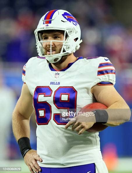 Buffalo Bills Long Snapper Reid Ferguson Holds The Ball Ahead Of An