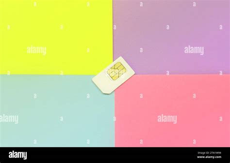 Subscriber Identity Module New White Sim Card On Bright Multicolor Background Minimal Flat Lay