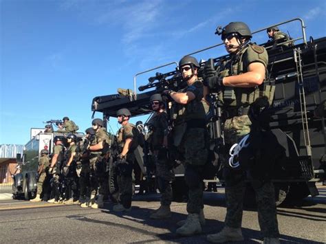 Ferguson Militarized Police Use Force Against Protesters Arrest