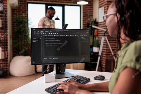 Premium Photo African American Software Developer Debugging Source Code Algorithm Looking At