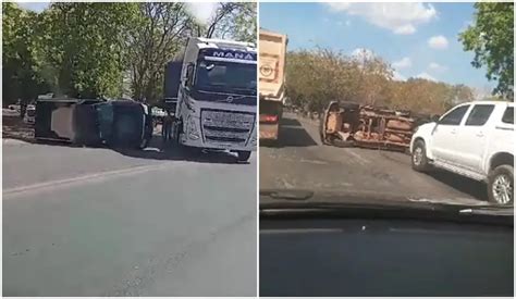 Caminhonete tomba após colidir carro que invadiu pista contrária em
