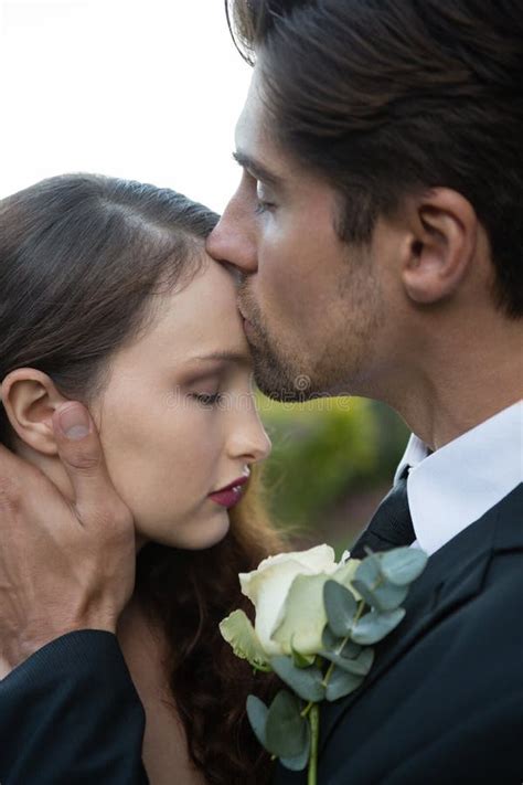 Groom Kissing On Bride Forehead Stock Image Image Of Celebration