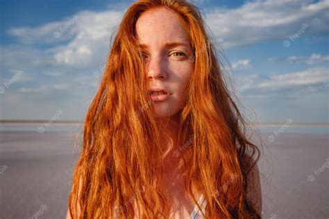 Premium Photo Beautiful Young Lady With Long Healthy Red Hair And