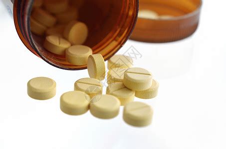 黄色药丸抗生素制药胶囊处方白色药品药片治愈药瓶治疗高清图片下载 正版图片321811815 摄图网