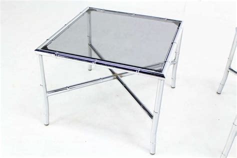 Pair Of Chrome Faux Bamboo X Base End Tables With Smoked Glass Tops For