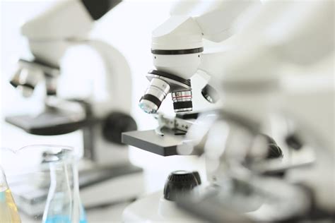 Premium Photo Closeup Of White Microscopes Standing In Row In