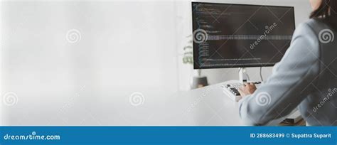 Female Programmer Typing On Computer Keyboard Programmer Designing