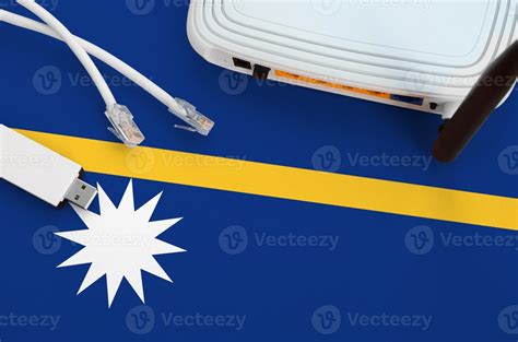 Nauru Flag Depicted On Table With Internet Rj45 Cable Wireless Usb