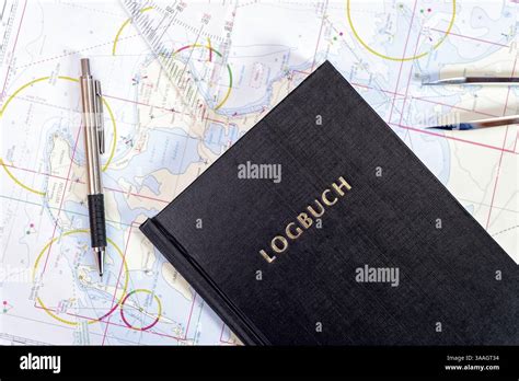 Navigation Book With Nautical Charts In The Chart Room On A Sailing
