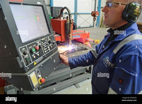 Cutting Machine High Resolution Stock Photography And Images Alamy