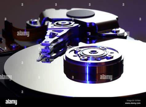 Computer Hard Drive Opened Reading Writing Head And Hard Disk Stock Photo Alamy