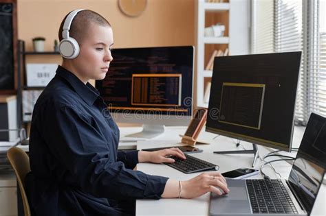 Portrait Of Female Programmer Wearing Headphones Stock Image Image Of
