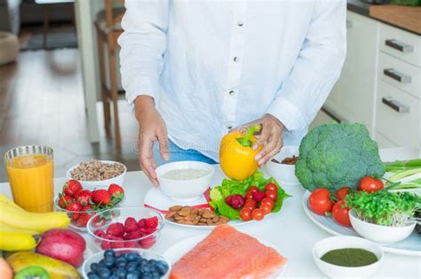 Female Nutritionist Expert Makes Healthy Balanced Diet Plate According