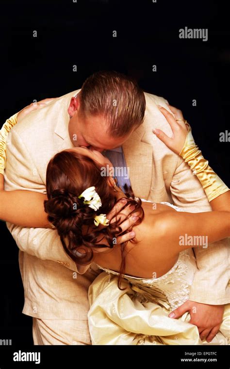 The Groom And The Bride Kiss Stock Photo Alamy