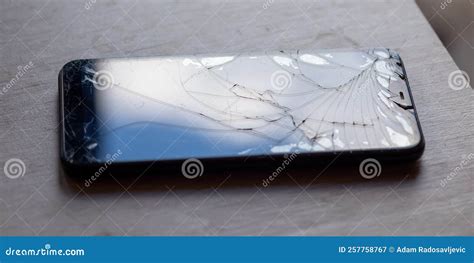 Smartphone With Broken Touchscreen Screen On Table Desktop Stock Image