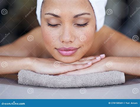 Perfectly Relaxed A Young Woman Lying On A Massage Table Stock Image