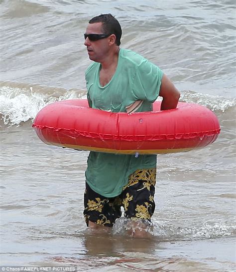 Adam Sandler Gets Hit In The Face By A Wave In Hawaii Daily Mail Online