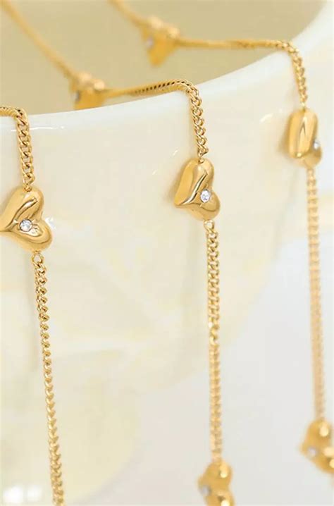 Buy YOUNIQ YOUNIQ WONDER 18K Gold Titanium Heart Bracelet Earrings