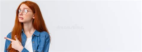 Tempting Cute Redhead Girl Seeing Something She Wanted Biting Lip Wishful And Frowning As Eager