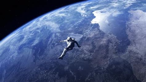 Astronaut Falling From Space To Planet Earth With Zero Gravity Lonely