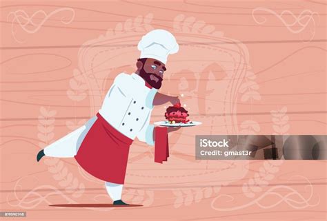 아프리카계 미국인 요리사 요리사 나무 질감된 배경 위에 흰색 레스토랑 유니폼에서 만화 최고 웃 고 디저트 접시를 들고 그릇에
