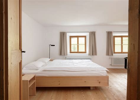 Baumhauer Adds Timber Living Spaces To Swiss Farmhouse