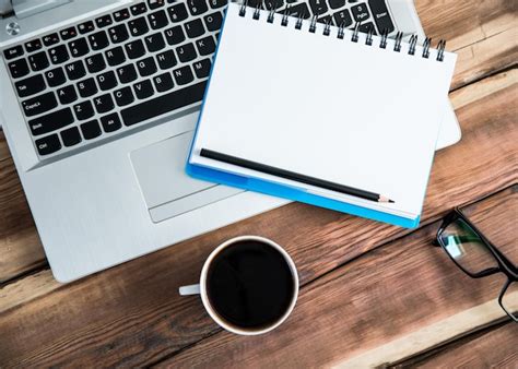 Premium Photo Notepad On Keyboard