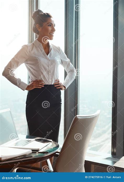 Enjoying The View From The Top An Attractive Young Businesswoman