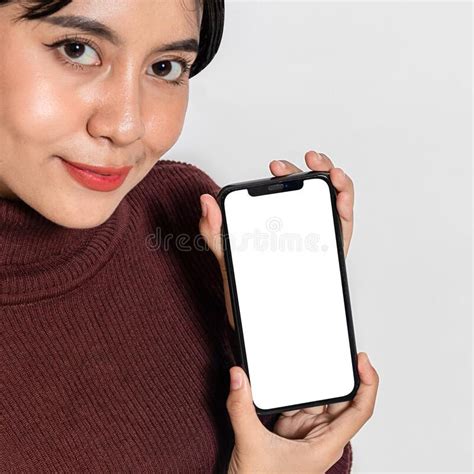 Mockup Of A White Blank Screen Smartphone Featuring A Woman Presenting