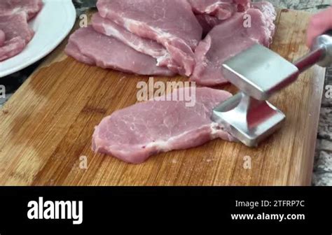Tenderizing Pork Cut With Meat Mallet Tool Using Meat Pounder Meat