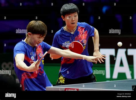 Sun Yingsha And Wang Manyu Of China Return A Shot To Hina Hayata And