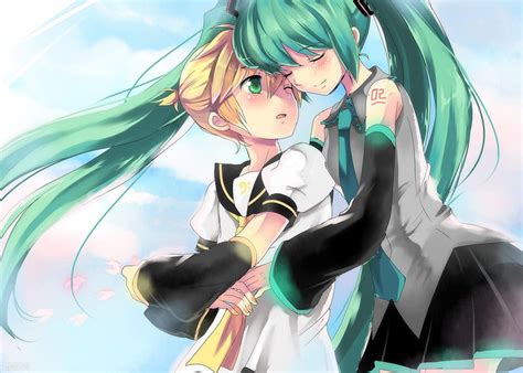 Len Kagamine And Miku Hatsune Wallpaper