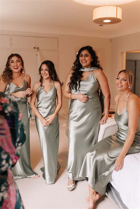 Green Mismatched Bridesmaid Dresses At Lulworth Castle Wedding