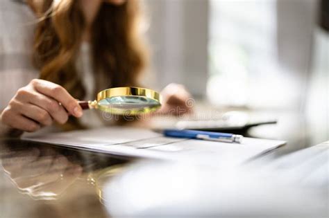 Business Fraud Investigation Using Magnifying Glass Finance Stock