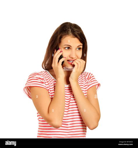 An Agitated Upset Nervous Girl Bites Her Nails Keeps A Modern Smartphone Feels Upset