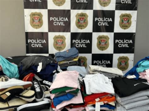Roupas de marcas de luxo falsificadas são apreendidas pela polícia em lojas de Campinas