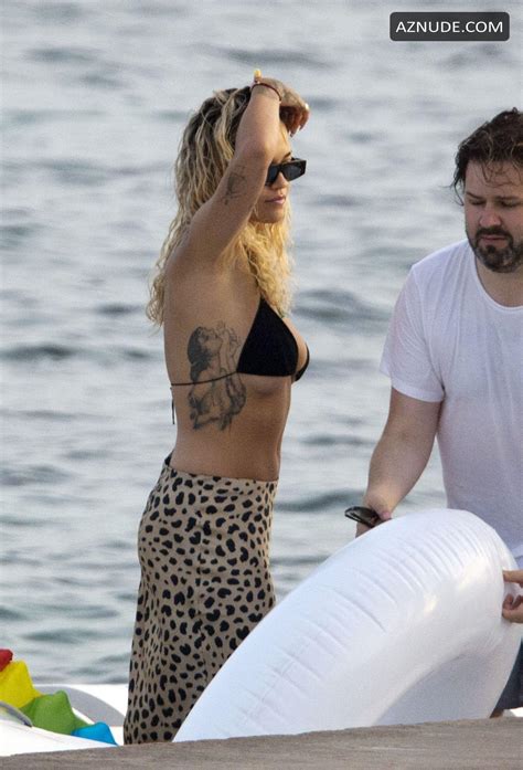 Rita Ora Flashes Underboob Getting Off Of A Boat In Ibiza Aznude