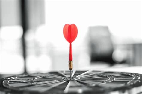 Premium Photo Dart Symbol In The Center Of The Target Represents Business Strategy