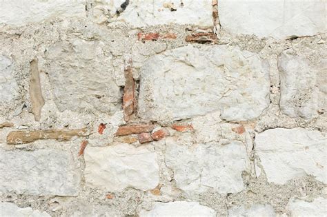 Светлая старая текстура кирпичной кладки древняя кирпичная стена