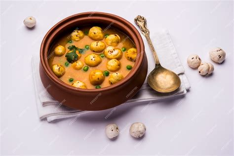 Premium Photo Phool Makhana Matar Gravy Sabzi Or Lotus Seeds Peas