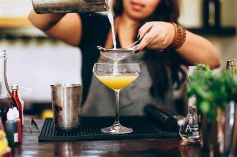 What Does A Bartender Do Mixology Popping Bottles And Hospitality