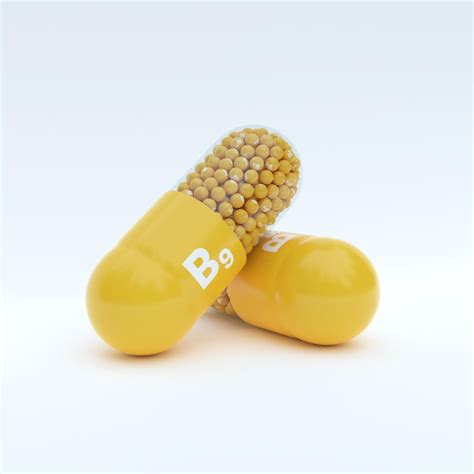 Premium Photo | Vitamin B9 With Yellow Capsule Granules and White ...