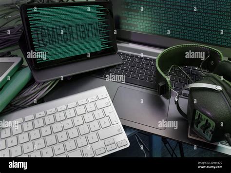 Binary Codes On The Screens Of The Computer And Tablette A Headphone