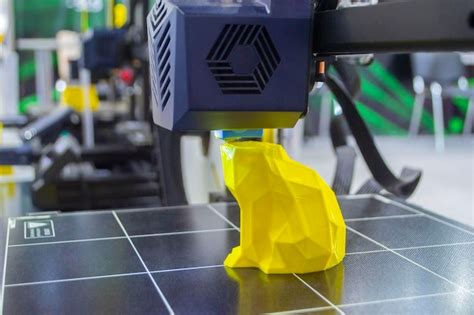 Premium Photo D Printer Printing Prototype Of Toy From Molten Plastic