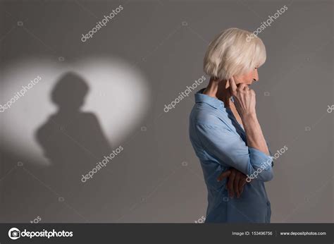 Woman With Heart Shaped Shadow Stock Photo NatashaFedorova 153496756