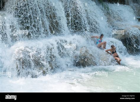 Tourist Are Enjoying Swimming At Tat Kuang Si Waterfall Luang Prabang