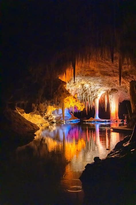 The Beautiful Colors Of Stalagtites And Stalagmites In Lake Cave